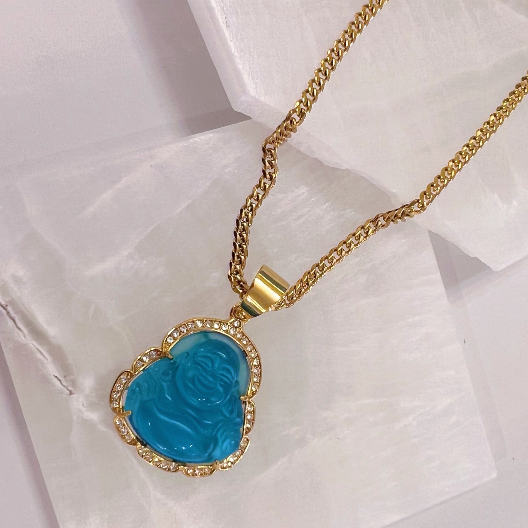 CRYSTAL LIGHT BLUE BUDDHA GOLD STEEL necklace – Mazza Boutique